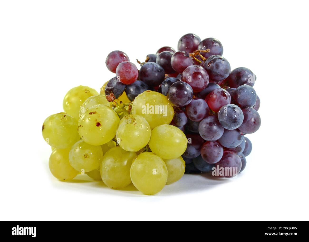 A bunch of overripe grapes isolated on white background Stock Photo - Alamy