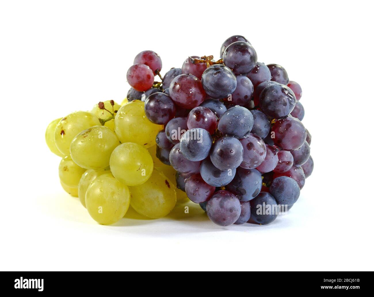 A bunch of overripe grapes isolated on white background Stock Photo - Alamy
