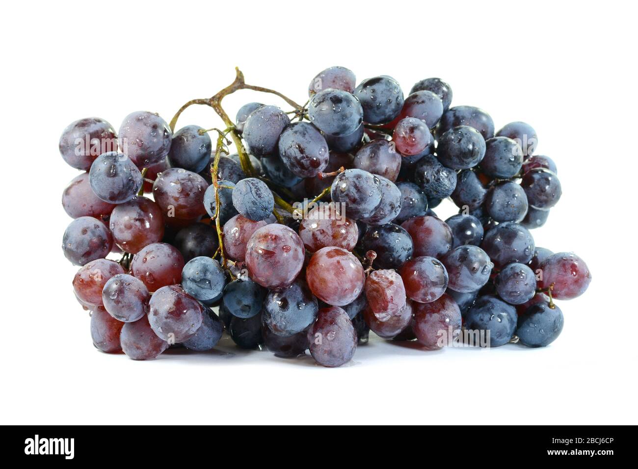 A bunch of overripe grapes isolated on white background Stock Photo - Alamy
