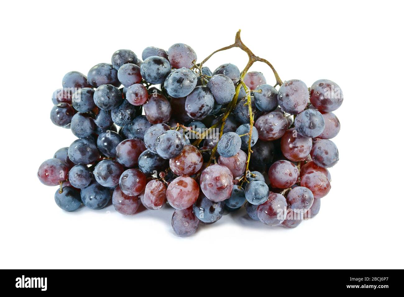A bunch of overripe grapes isolated on white background Stock Photo - Alamy
