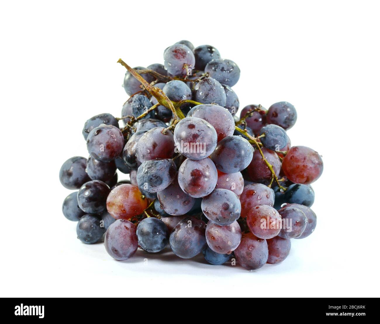 A bunch of overripe grapes isolated on white background Stock Photo - Alamy