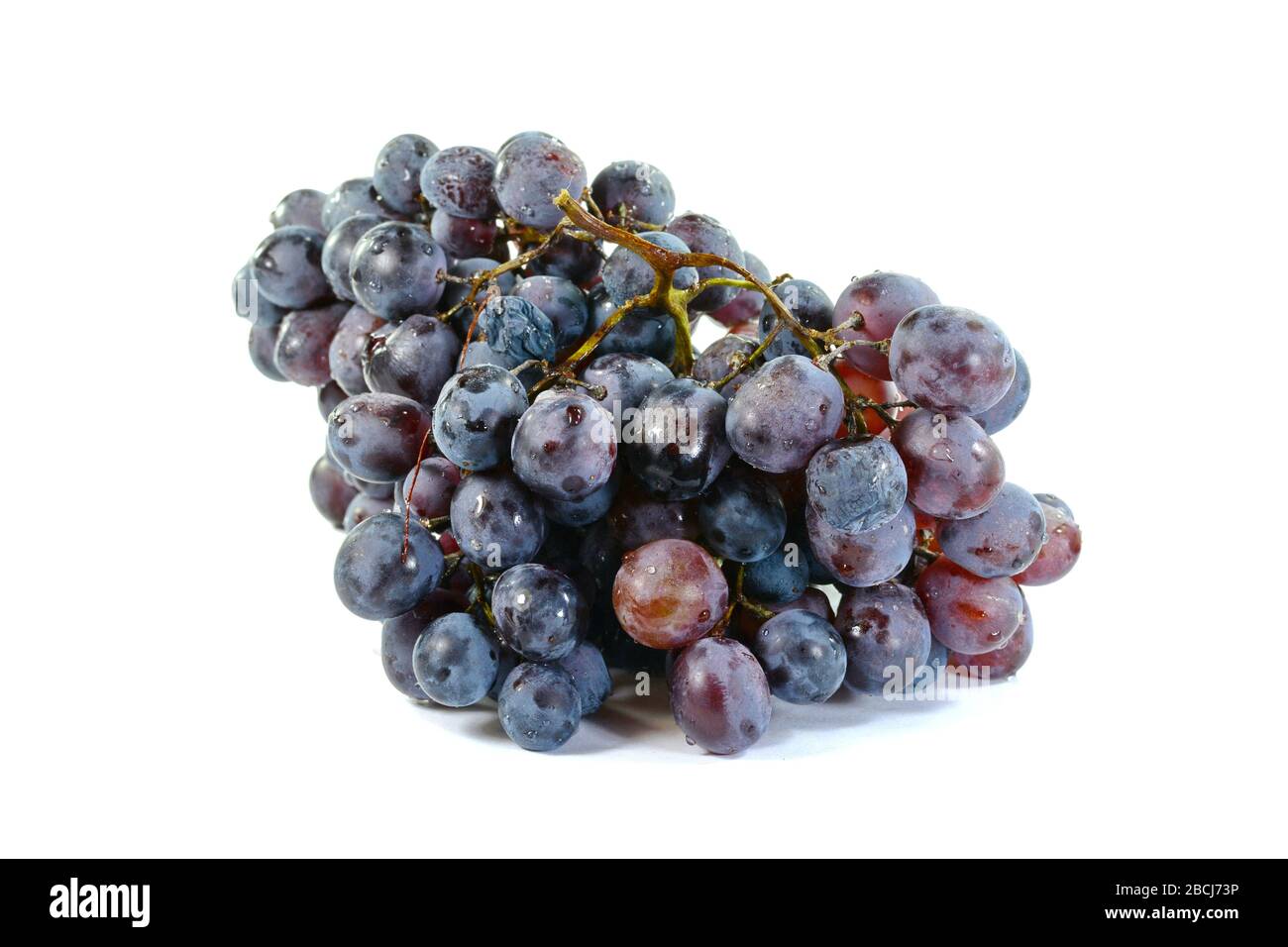 A bunch of overripe grapes isolated on white background Stock Photo - Alamy
