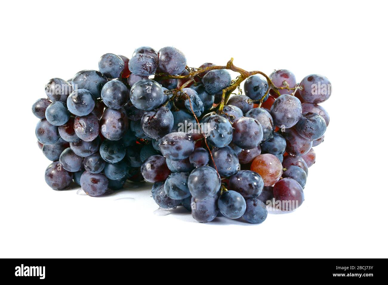 A bunch of overripe grapes isolated on white background Stock Photo - Alamy