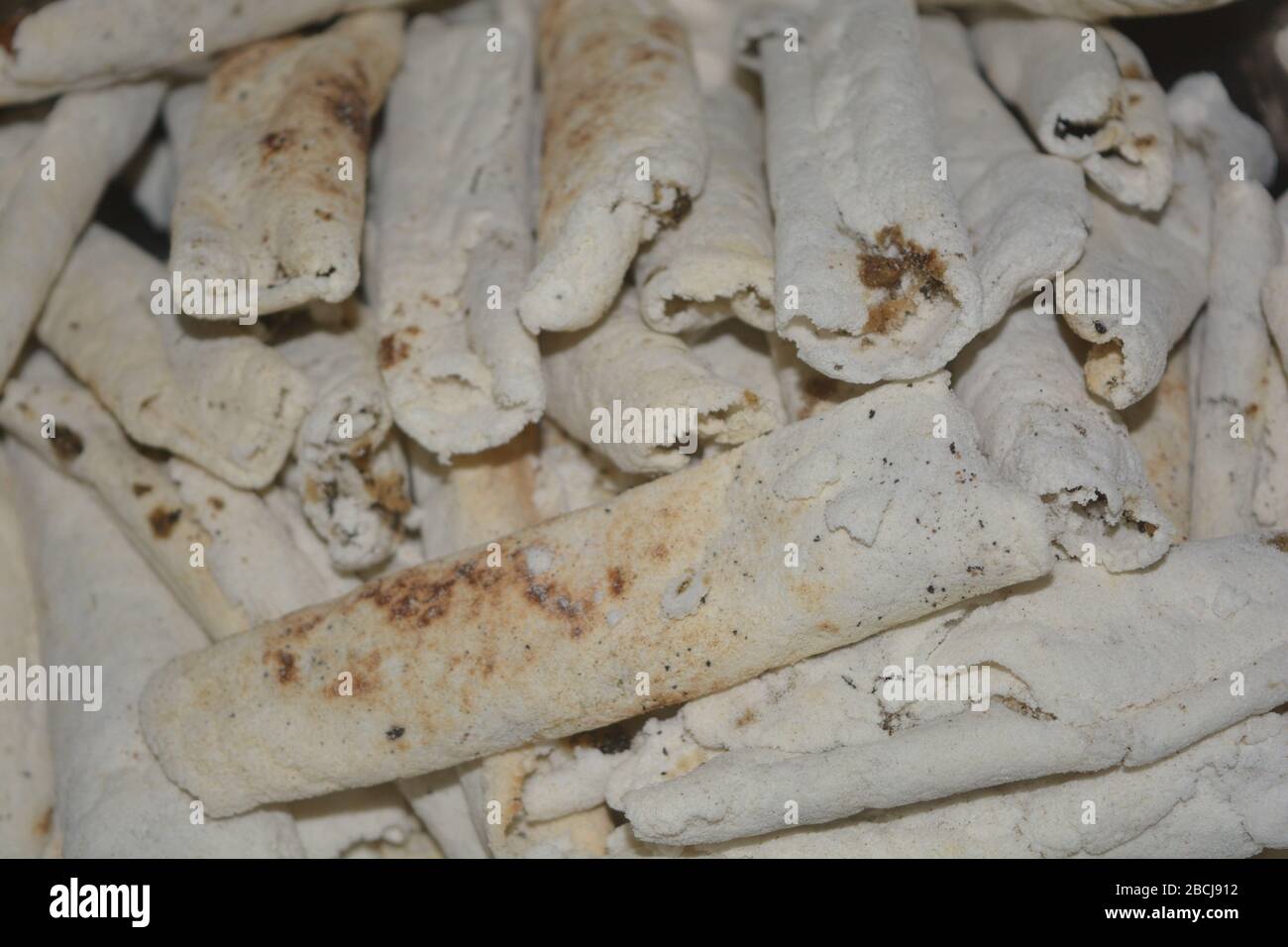 TIL PITHA, a Traditional sweet (food) of Assam Stock Photo - Alamy