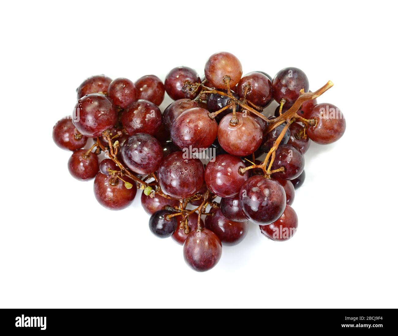 A bunch of overripe grapes isolated on white background Stock Photo - Alamy