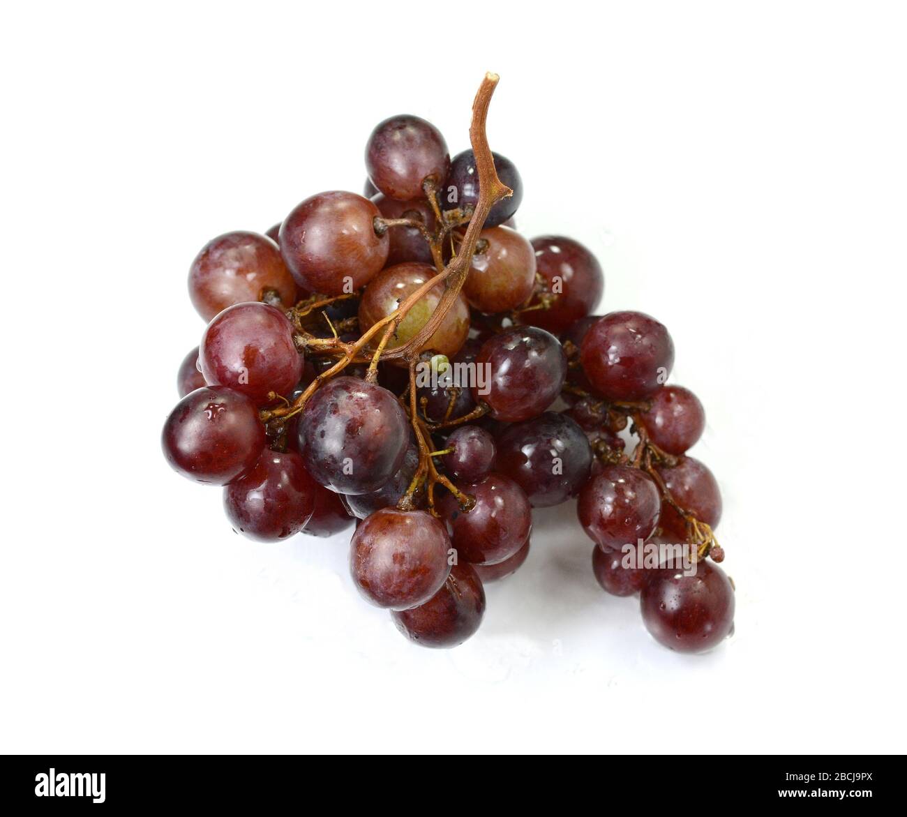 A bunch of overripe grapes isolated on white background Stock Photo - Alamy