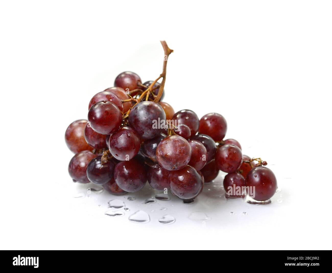 A bunch of overripe grapes isolated on white background Stock Photo - Alamy