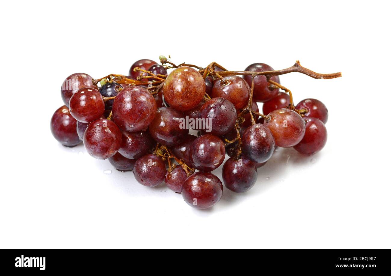 A bunch of overripe grapes isolated on white background Stock Photo - Alamy