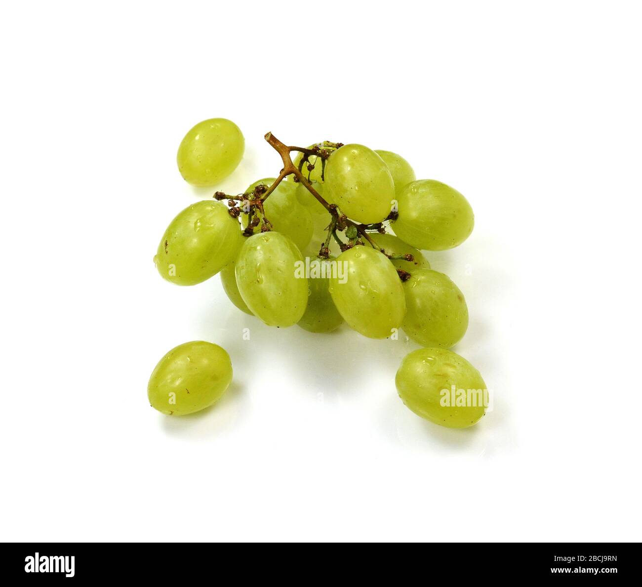 A bunch of overripe grapes isolated on white background Stock Photo - Alamy