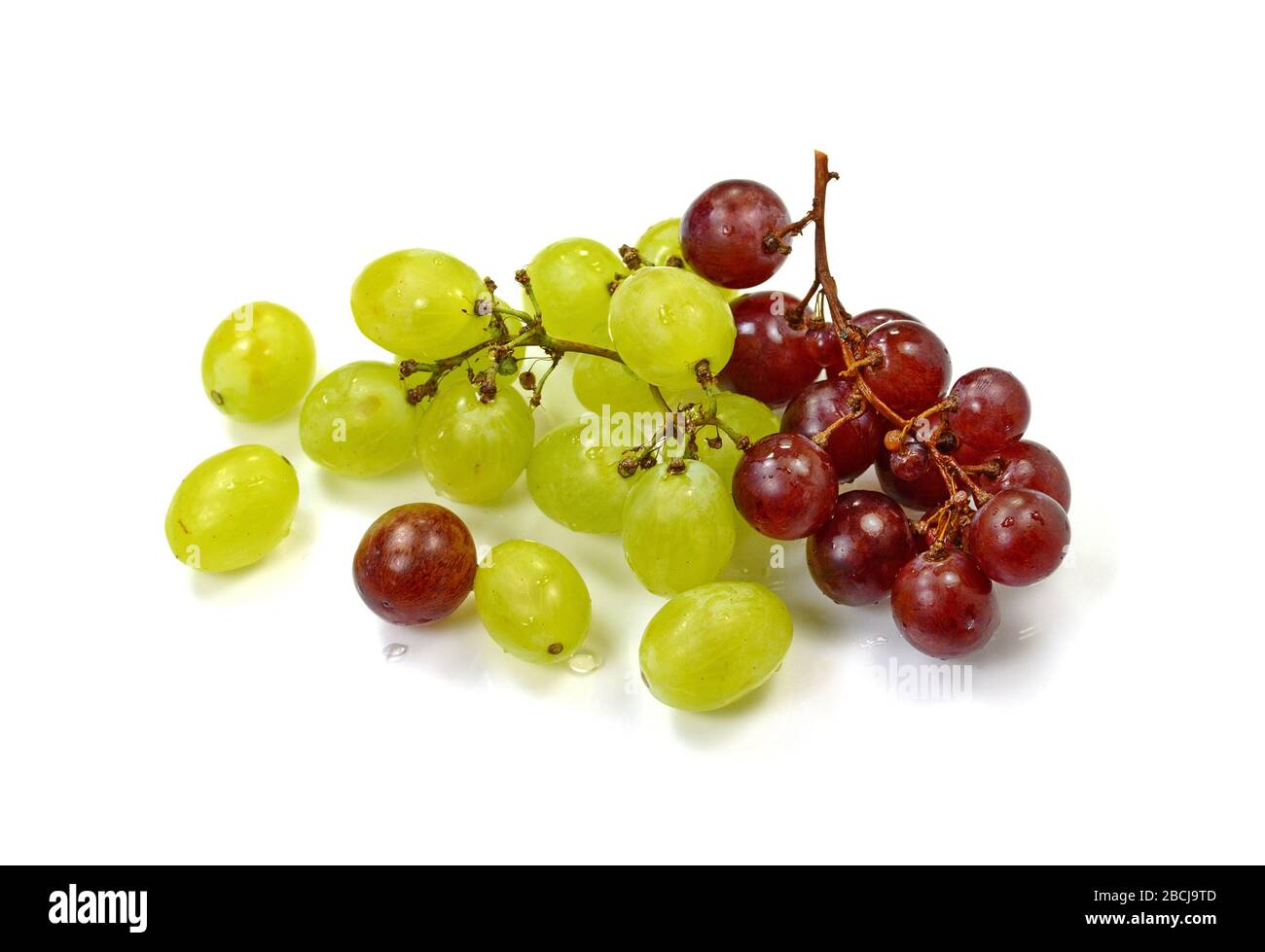 A bunch of overripe grapes isolated on white background Stock Photo - Alamy