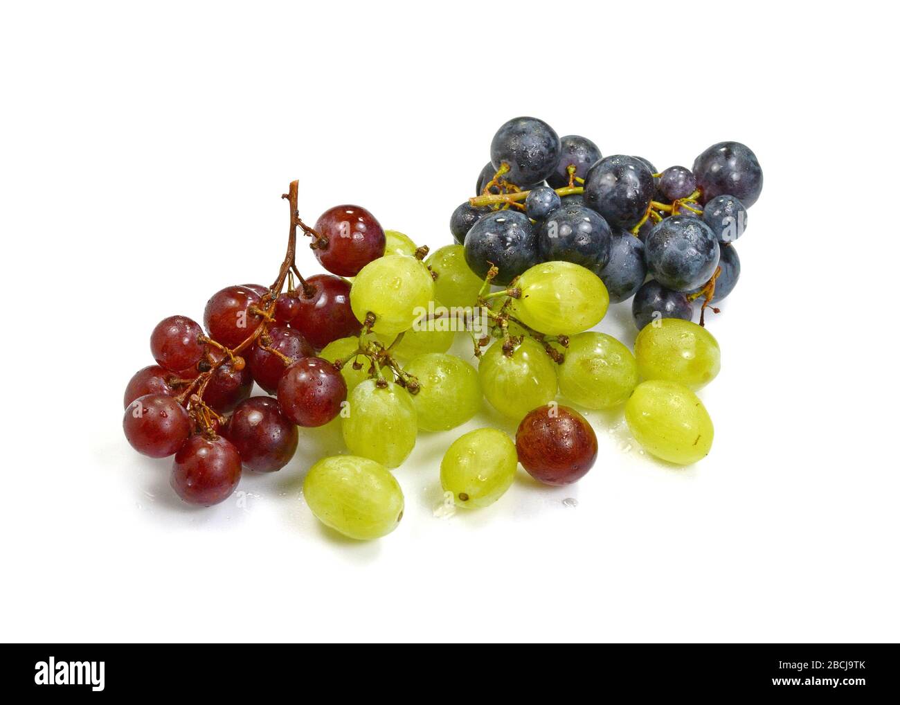 A bunch of overripe grapes isolated on white background Stock Photo - Alamy