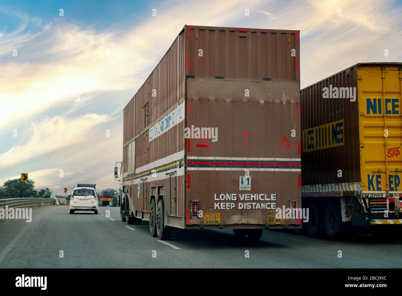 Two trucks overtaking hi-res stock photography and images - Alamy