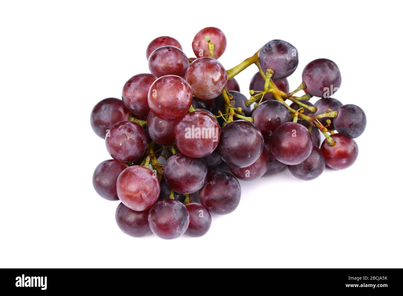 A bunch of overripe grapes isolated on white background Stock Photo - Alamy