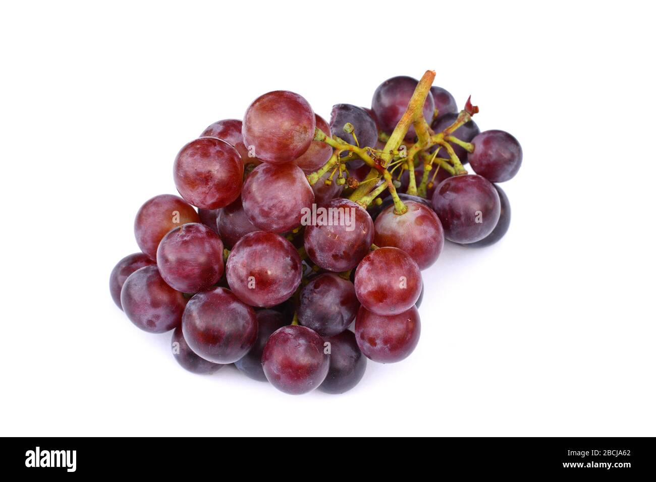 A bunch of overripe grapes isolated on white background Stock Photo - Alamy