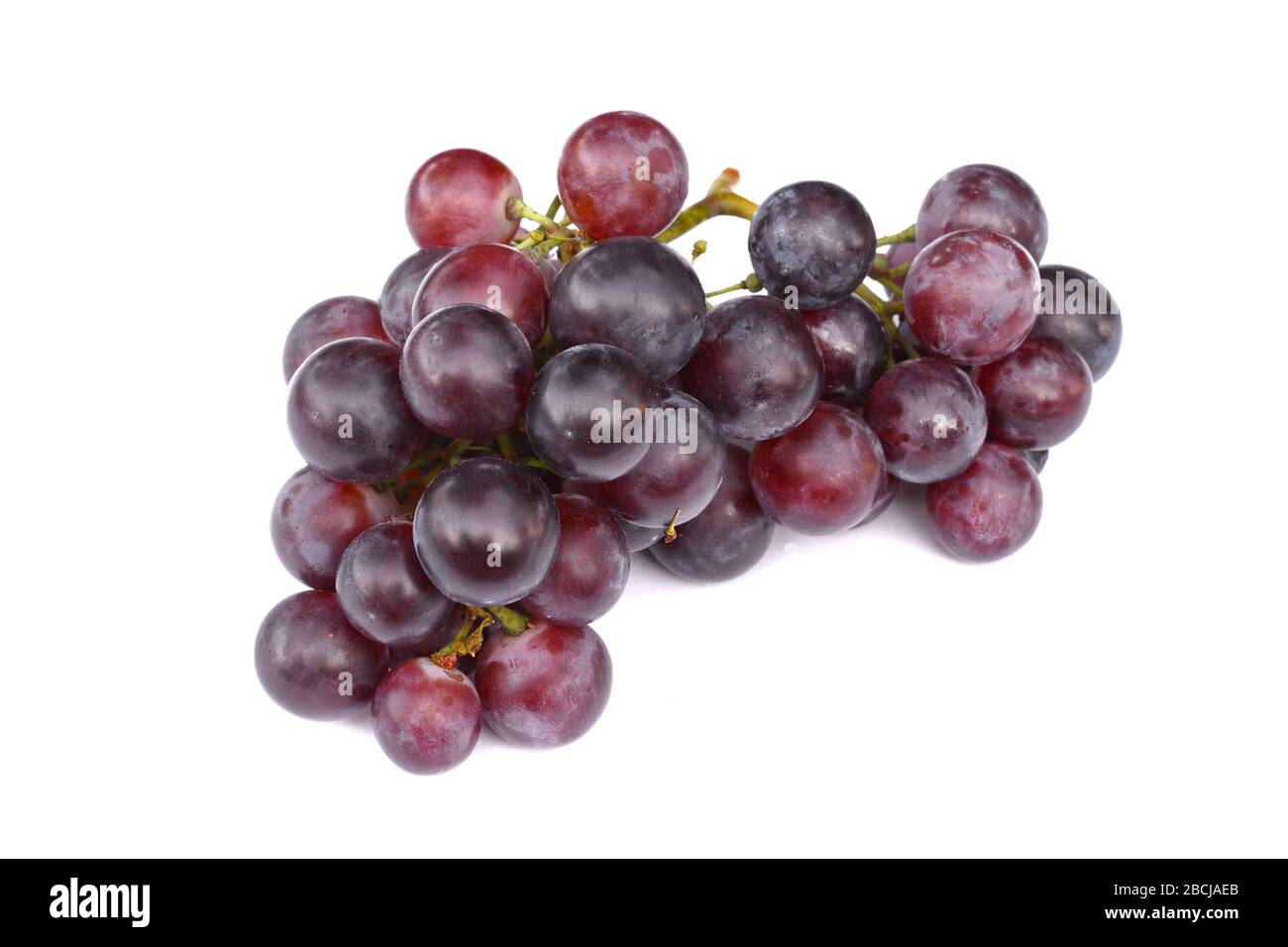 A bunch of overripe grapes isolated on white background Stock Photo - Alamy