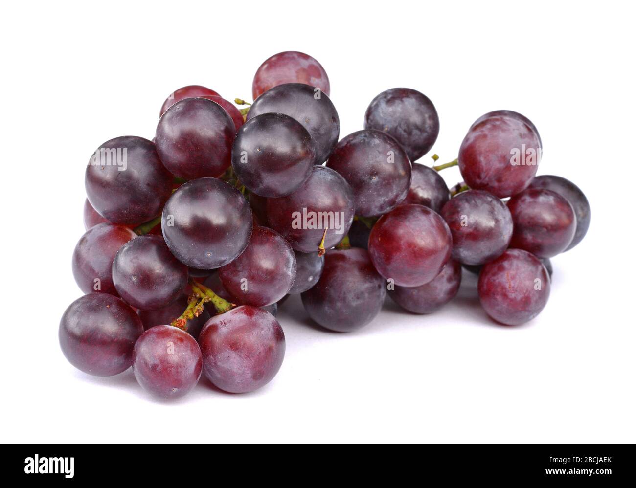 A bunch of overripe grapes isolated on white background Stock Photo - Alamy