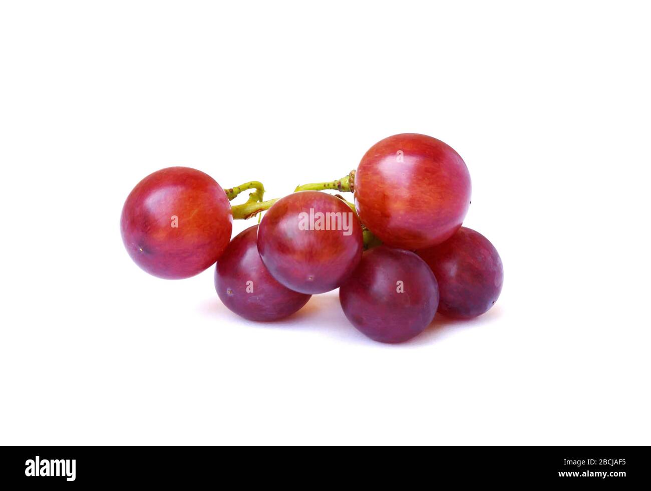 A bunch of overripe grapes isolated on white background Stock Photo - Alamy