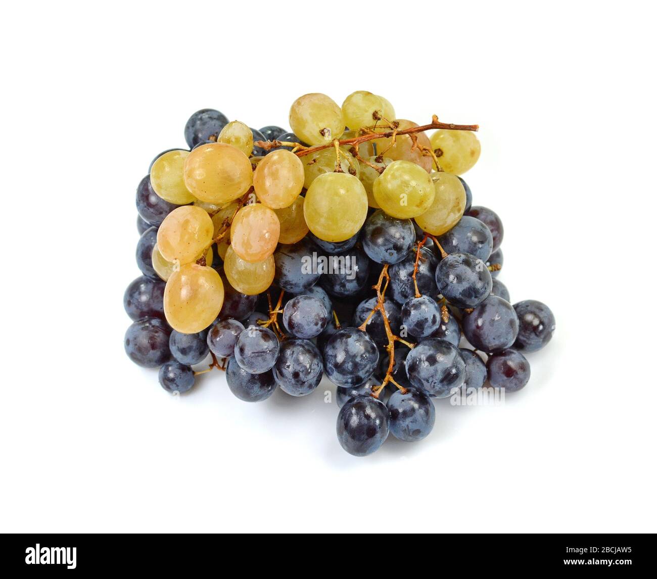 A bunch of overripe grapes isolated on white background Stock Photo - Alamy