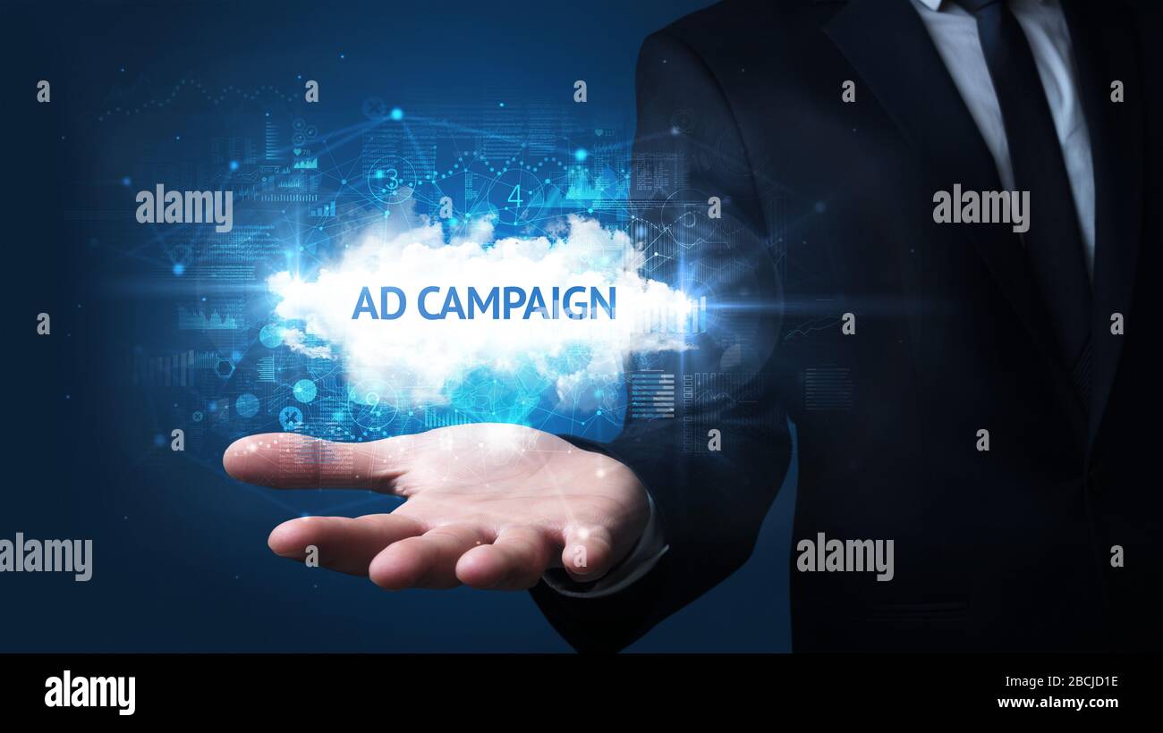 Hand of Businessman holding AD CAMPAIGN inscription, successful ...