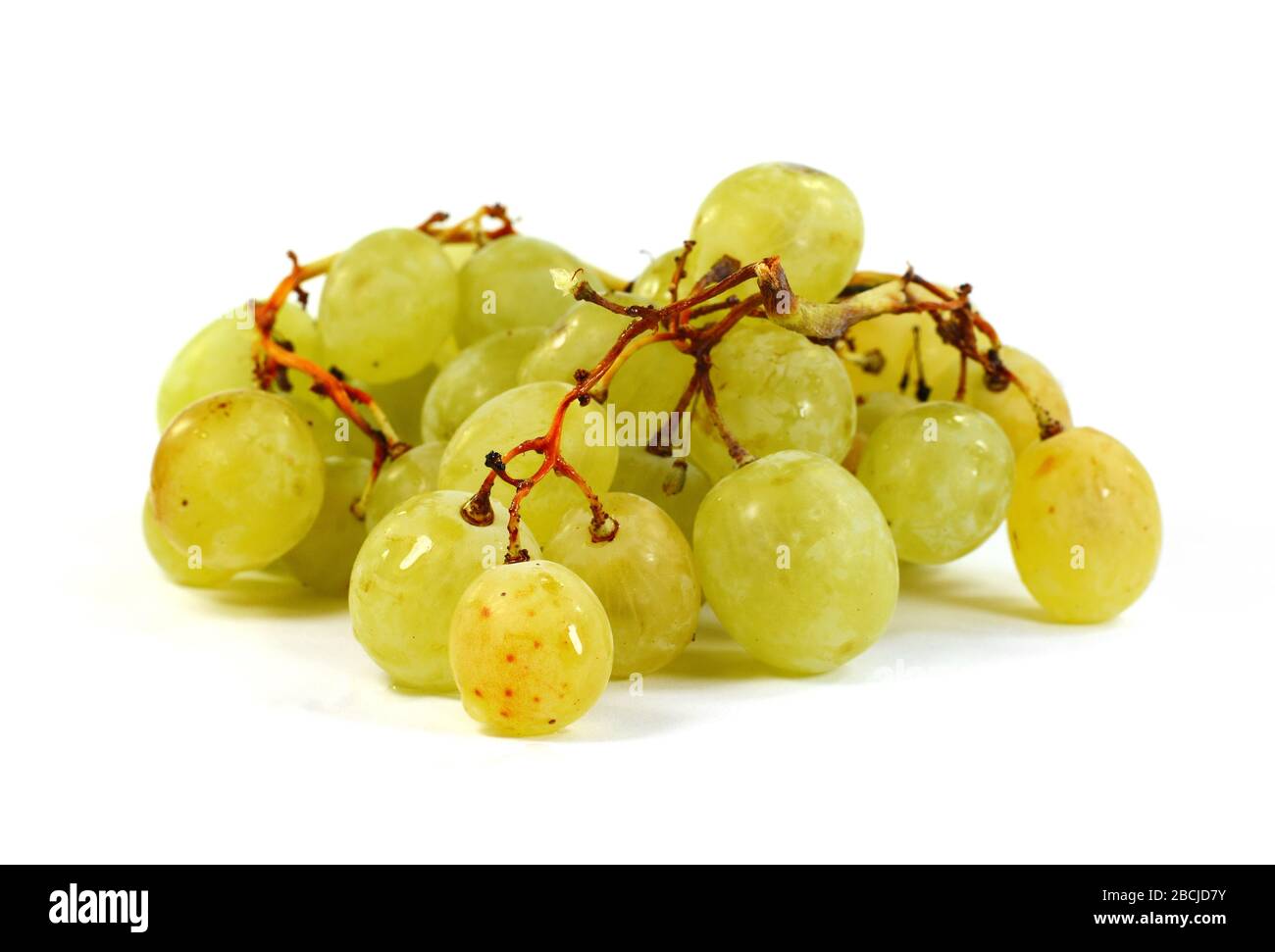 A bunch of overripe grapes isolated on white background Stock Photo - Alamy