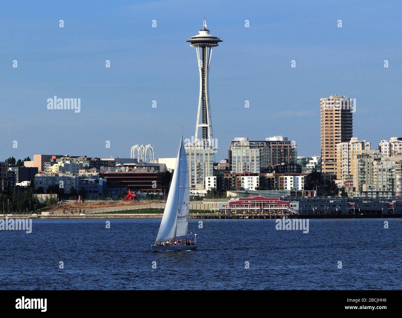 Sail Boat In Front Of The Waterfront Skyline Of Seattle Stock Photo - Alamy
