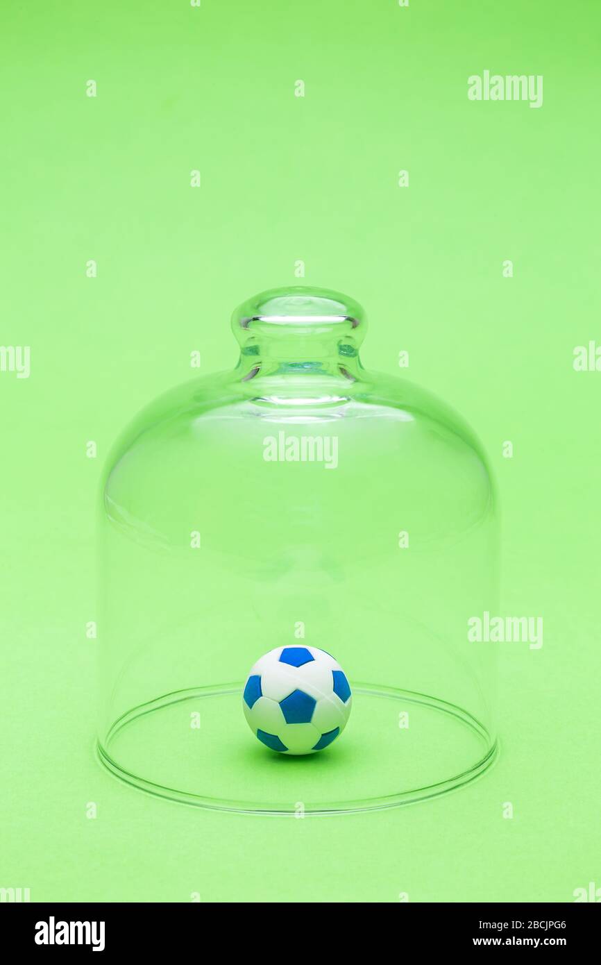 Soccer ball in quarantine. Sport and coronavirus minimal creative ...