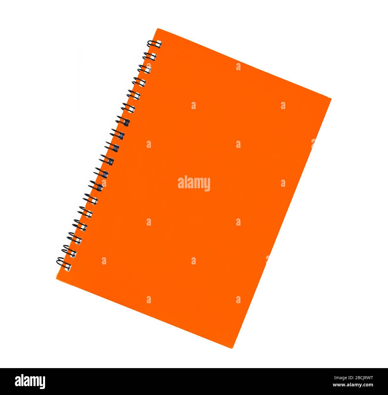 Orange color covered single note paper diary isolated on an empty white ...