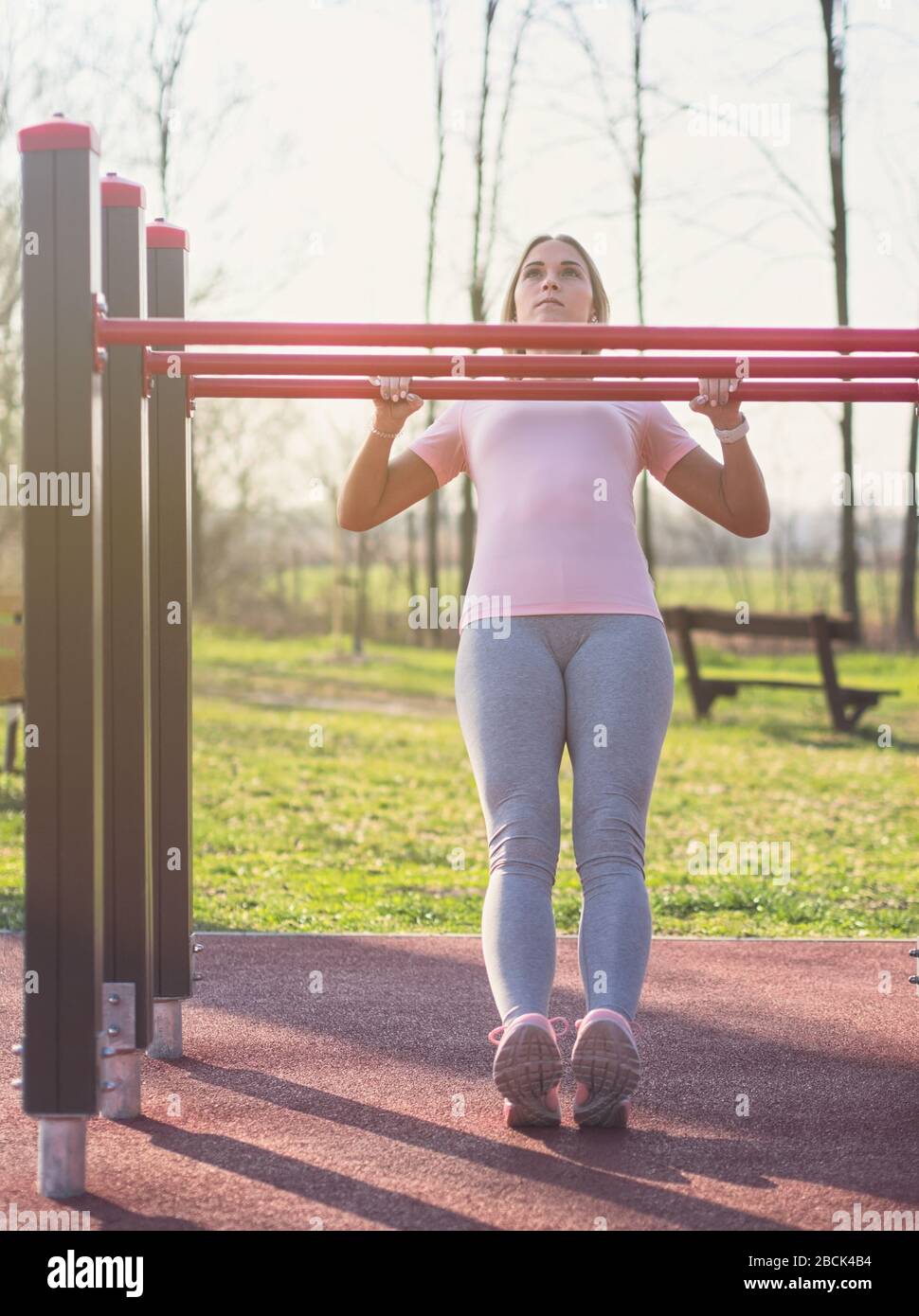 Girl doing pull ups hi-res stock photography and images - Alamy