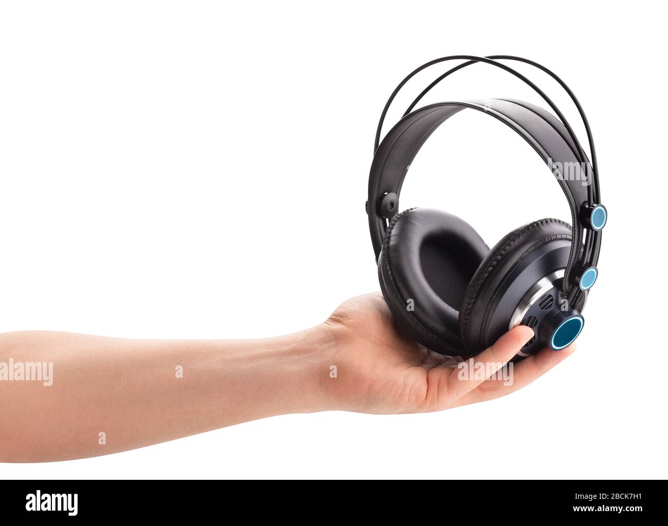 monitor headphones in hand path isolated on white Stock Photo - Alamy