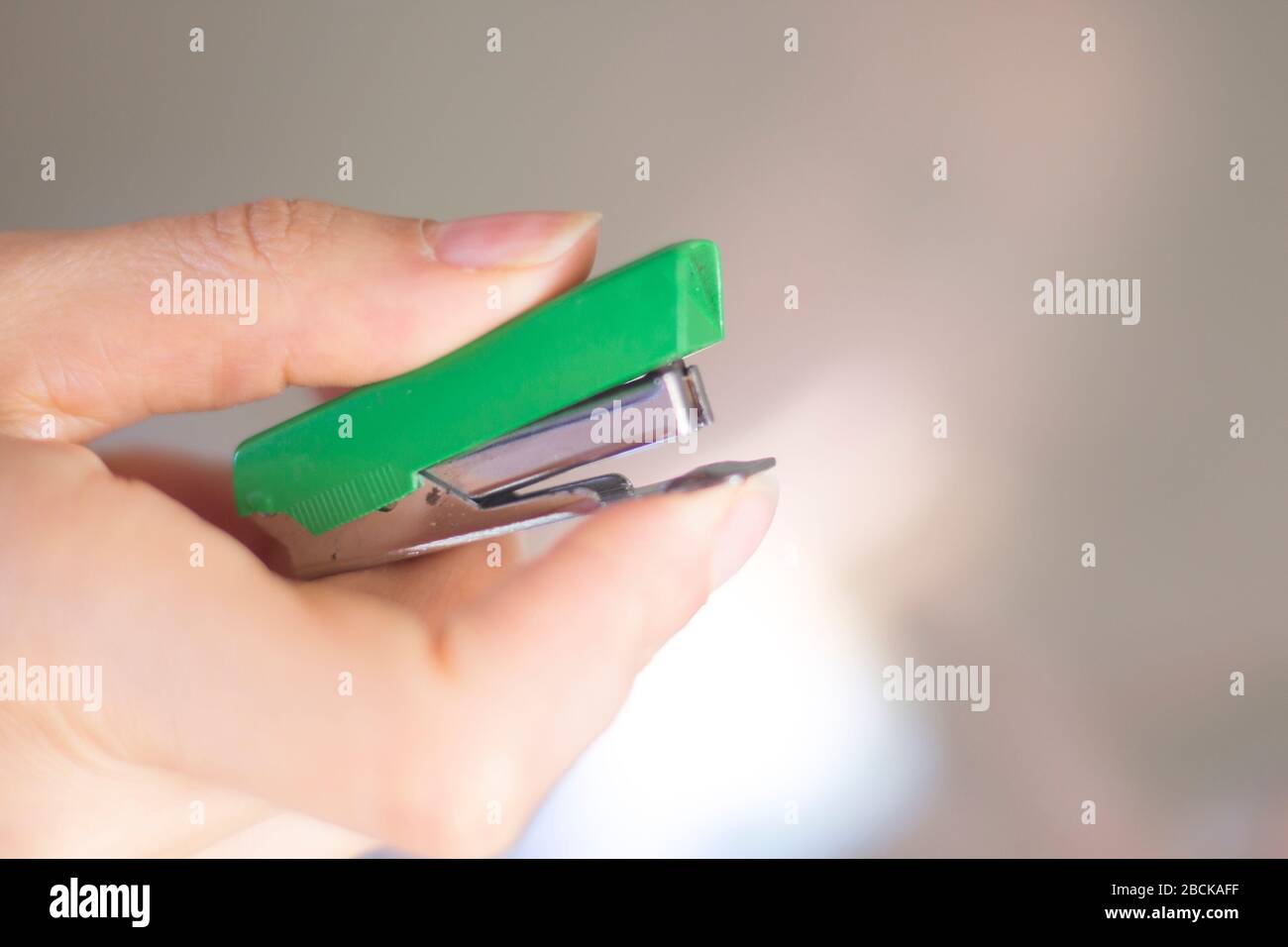 Staple gun woman hi-res stock photography and images - Alamy