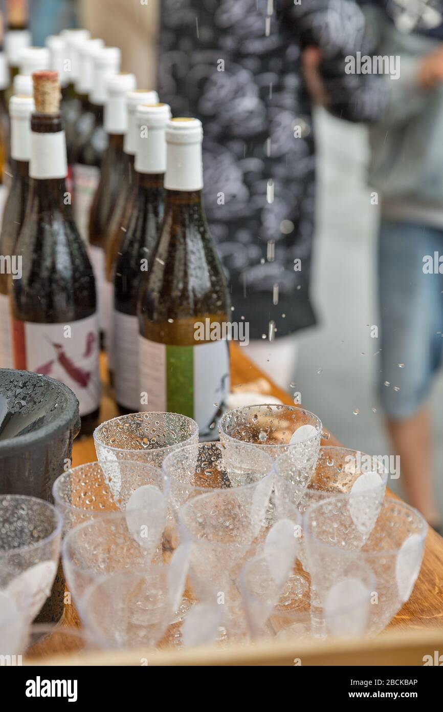 Wine tasting outdoors under the rain Stock Photo - Alamy