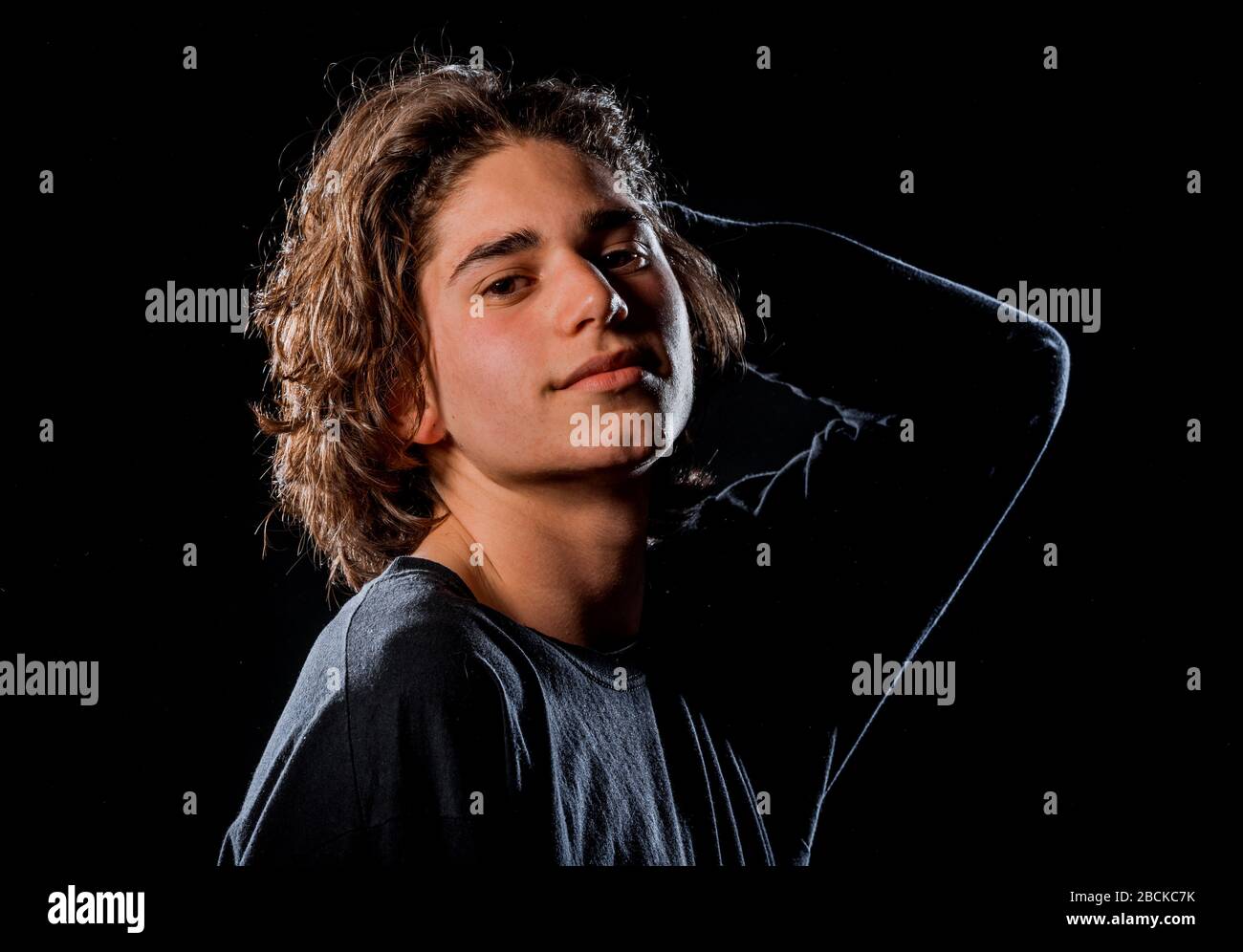 Portrait of a handsome male model posing in cool fashionable clothing ...