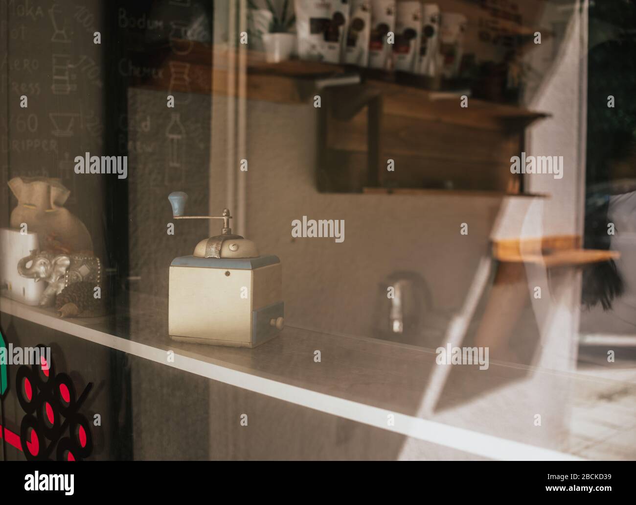 Interior design in coffe shop shot through the window Stock Photo - Alamy