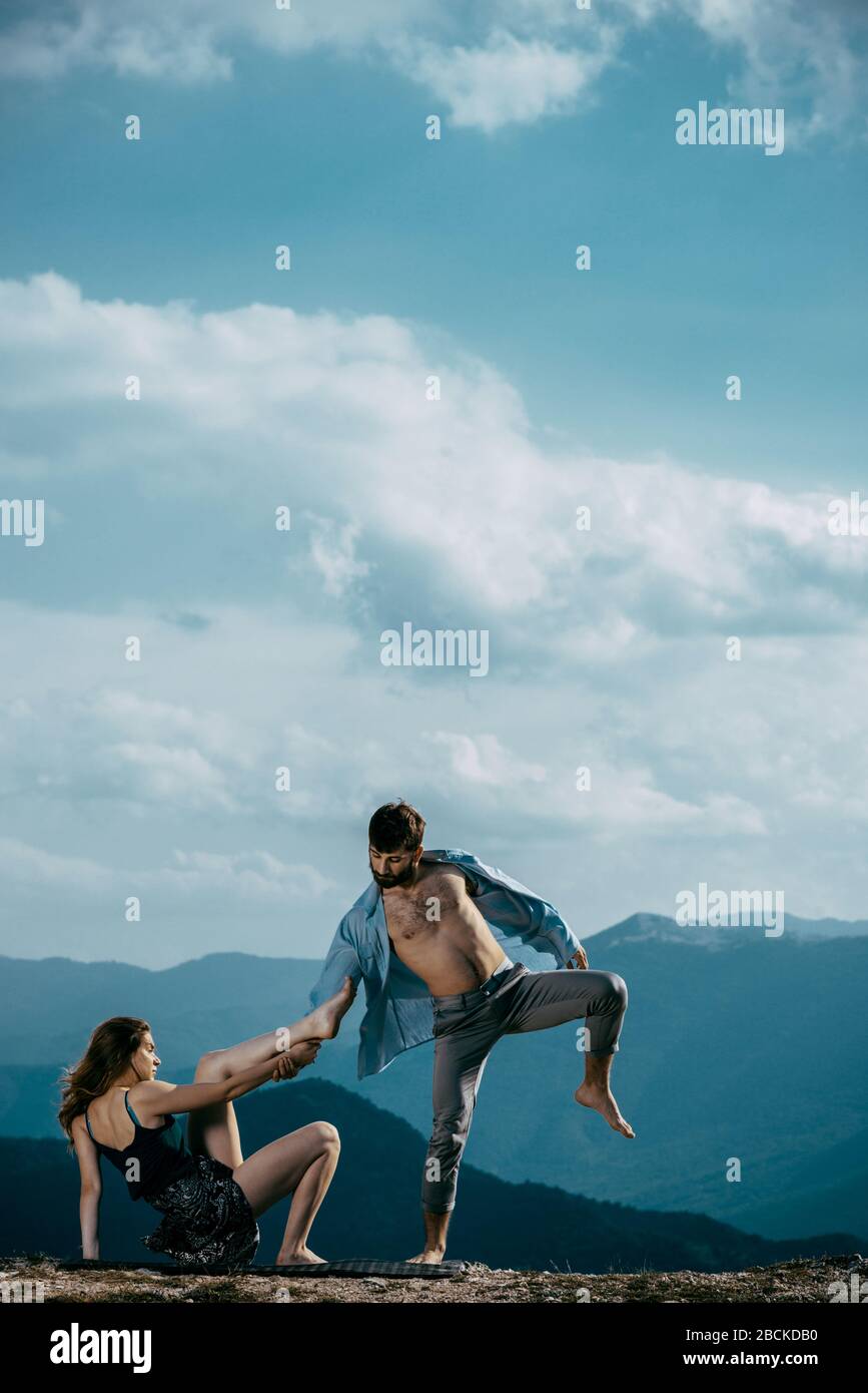 Sport, dancing and urban culture concept - beautiful dancing couple in ...