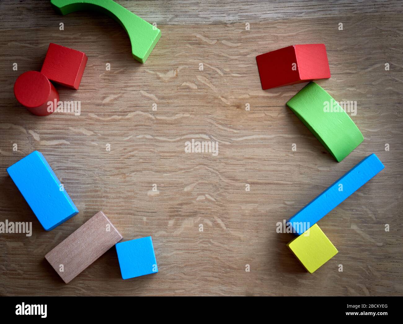 set of children's wooden blocks in various colours for building on a ...