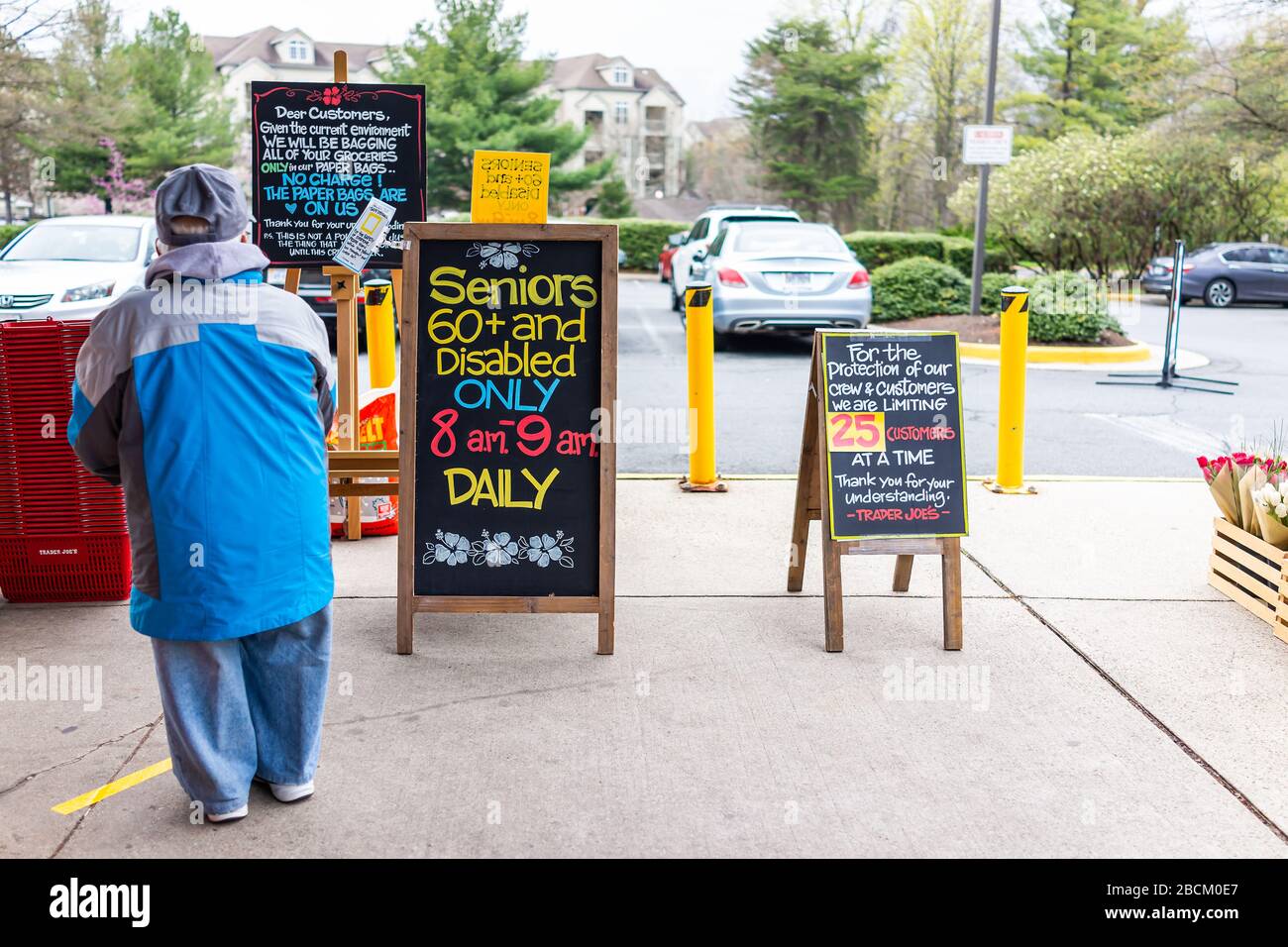Reston, USA - April 1, 2020: Trader Joe's grocery store sign for senior ...