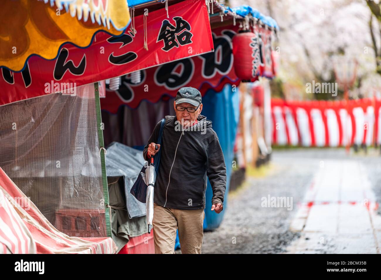 Kyoto, Japan - April 10, 2019: Hirano Shinto shrine with man walking at ...