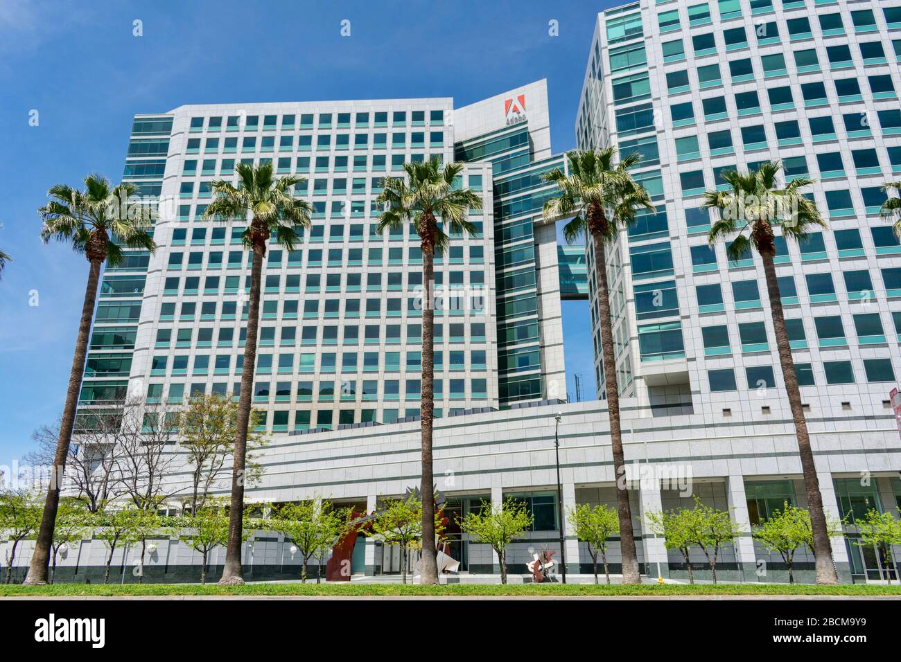 Adobe logo is displayed on Adobe Inc. office headquarters towers. Logo ...