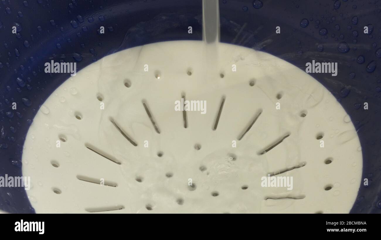 Slow motion pouring water glass hi-res stock photography and images - Alamy