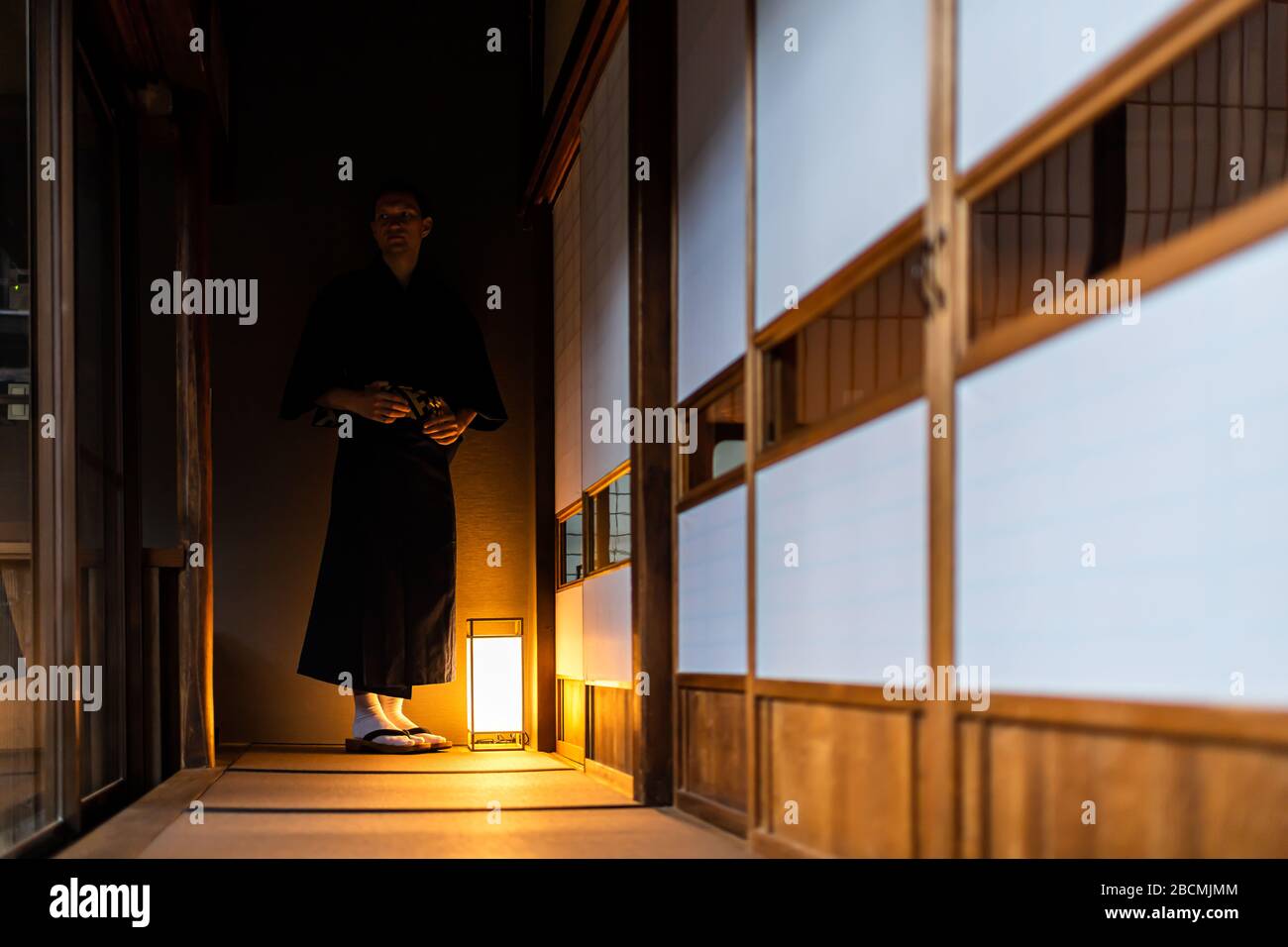 Japanese ryokan traditional house with man in kimono yukata with tabi ...