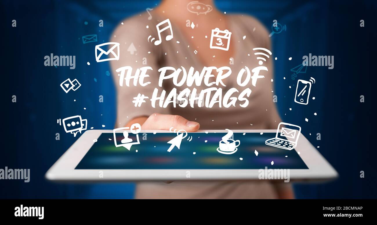 Young business person working on tablet and shows the inscription: THE ...