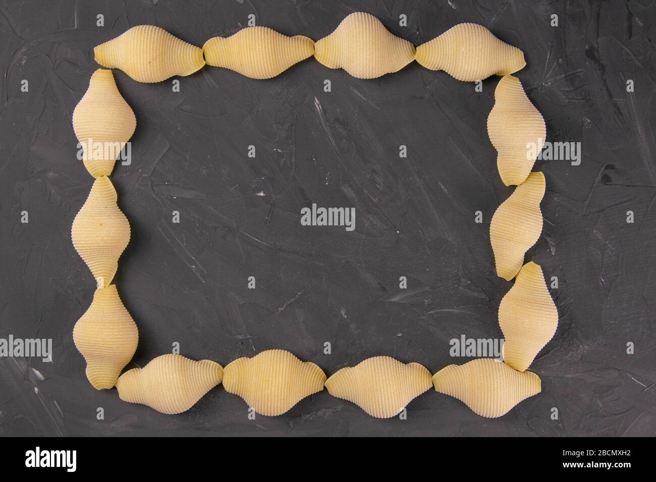 Conchiglie pasta shell composition in the shape of a rectangle with an ...