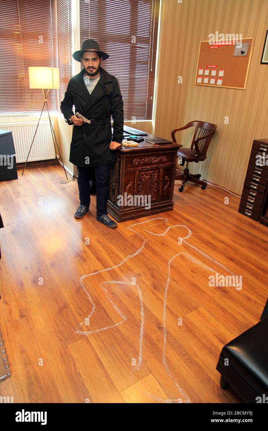 ISTANBUL, TURKEY - MAY 15: Turkish private detective working his desk ...