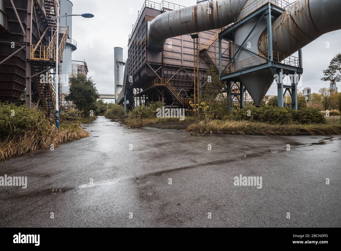 Industrial buildings in abandoned factory Stock Photo - Alamy
