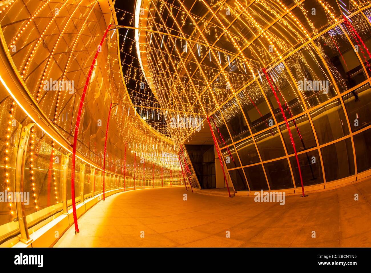 Glass walled buildings at night Stock Photo - Alamy