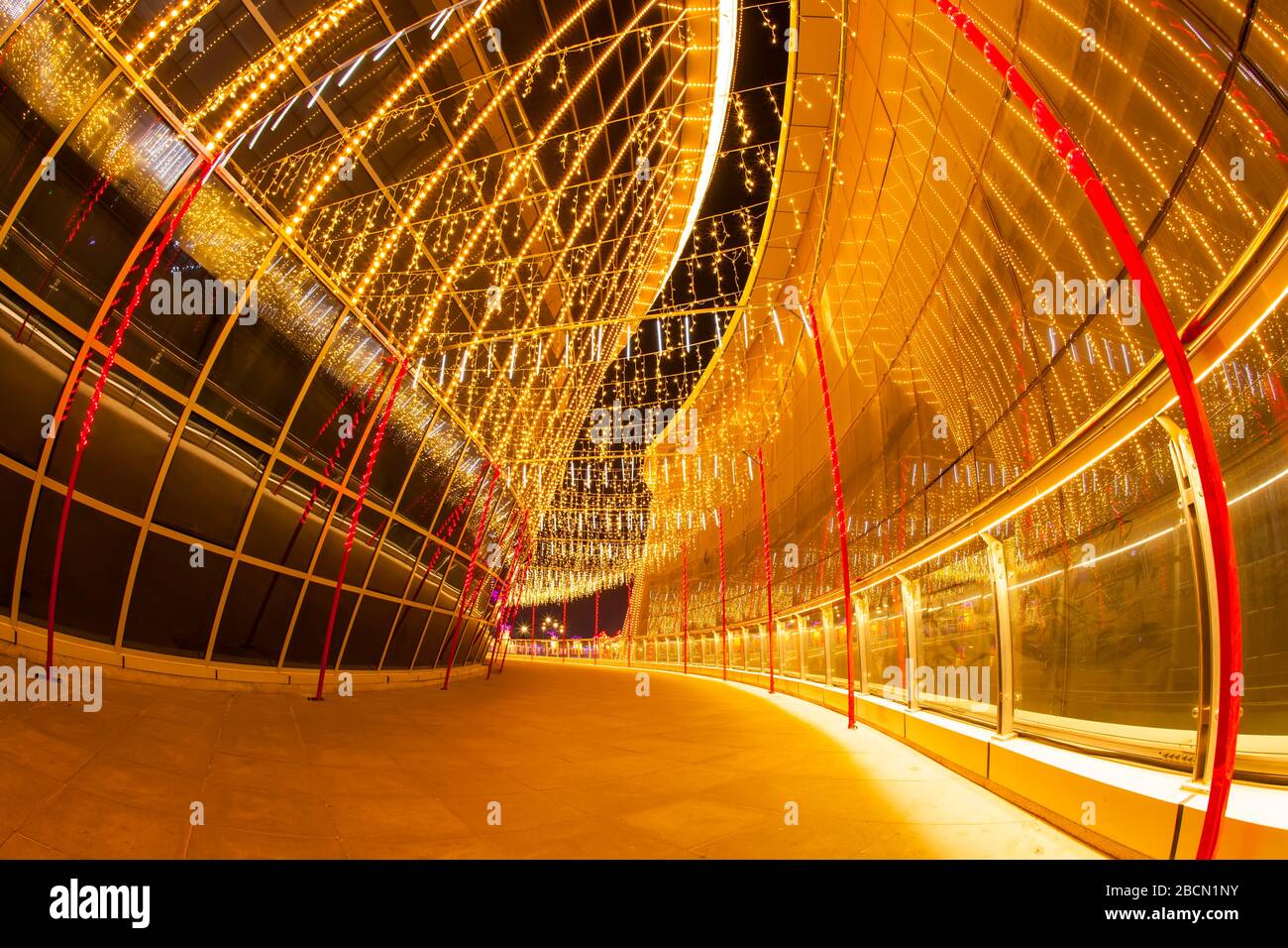 Glass walled buildings at night Stock Photo - Alamy