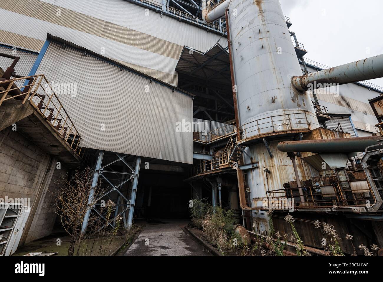 Industrial buildings in abandoned factory Stock Photo - Alamy
