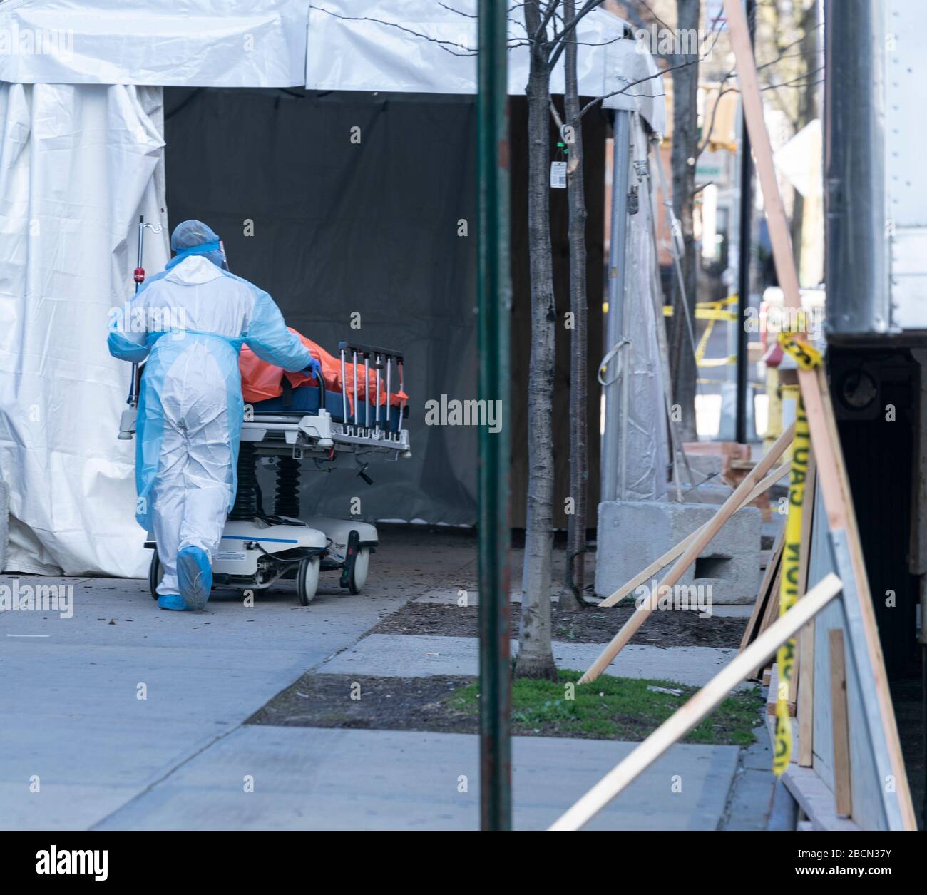New York, NY - April 4, 2020: Body of deceased patient in orange bag ...