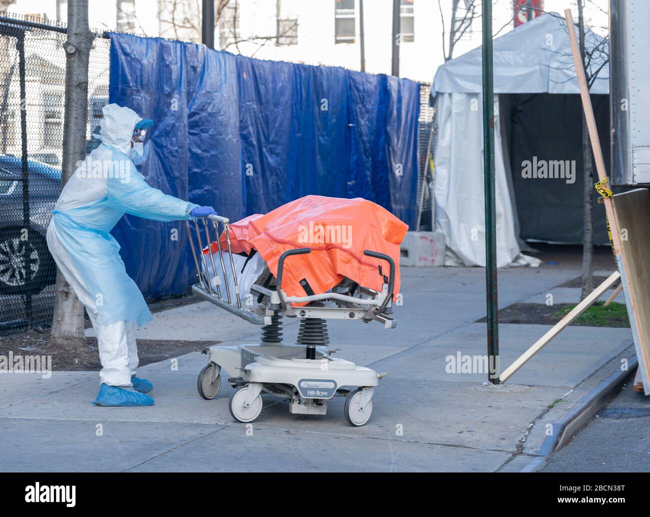 New York, NY - April 4, 2020: Body of deceased patient in orange bag ...