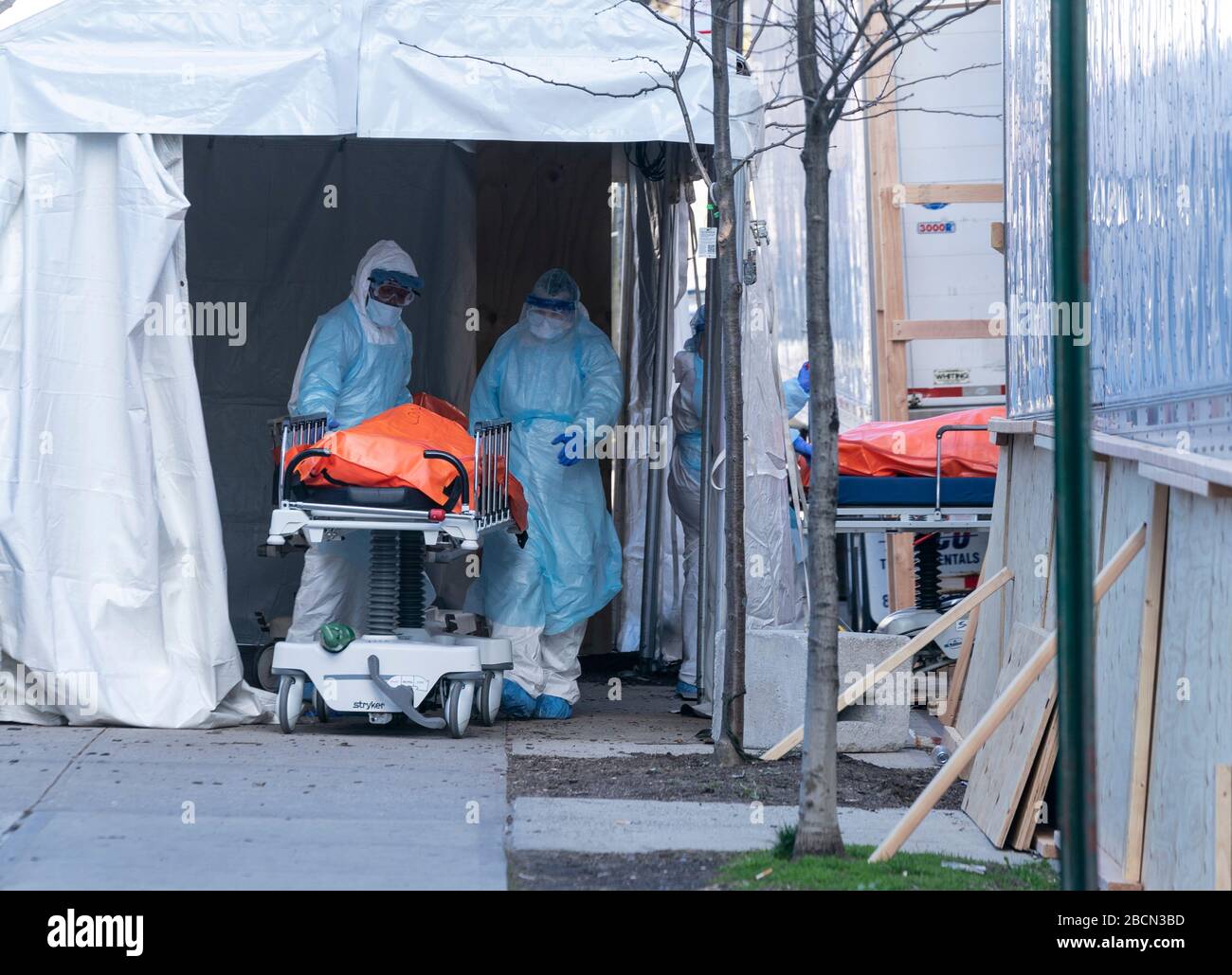 New York, NY - April 4, 2020: Body of deceased patient in orange bag ...